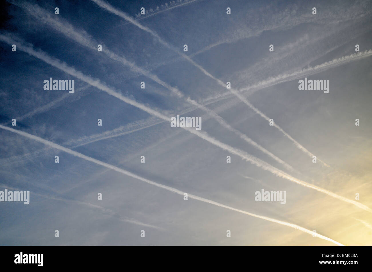 Passenger aircraft with contrails hi-res stock photography and images ...