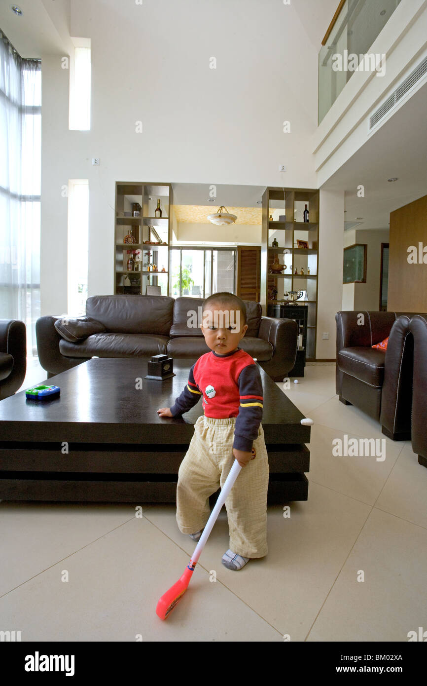 modern villa, living, young boy in living room, luxury apartment ...