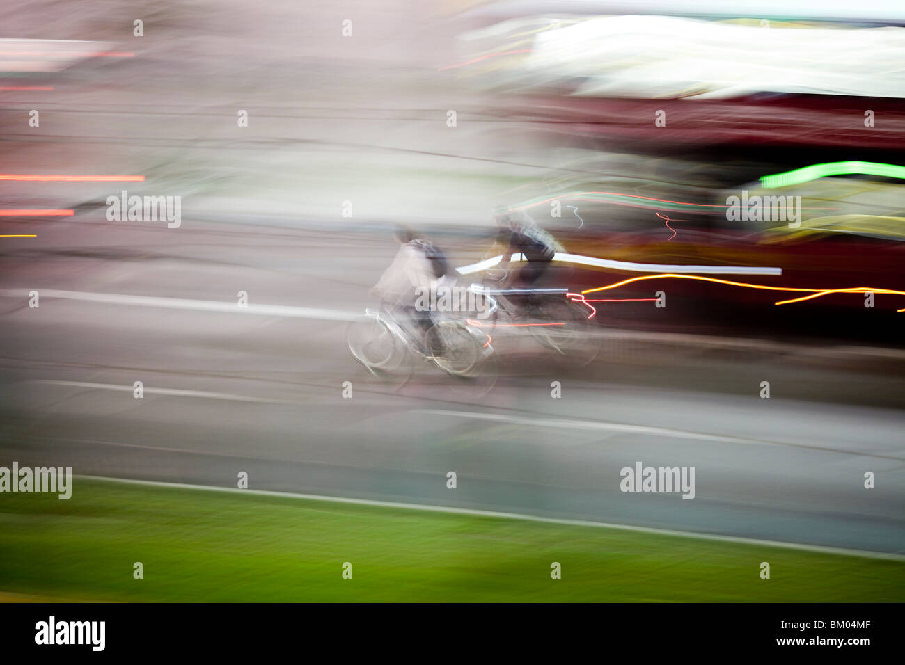 Panning shot of cyclists by night hi-res stock photography and images ...