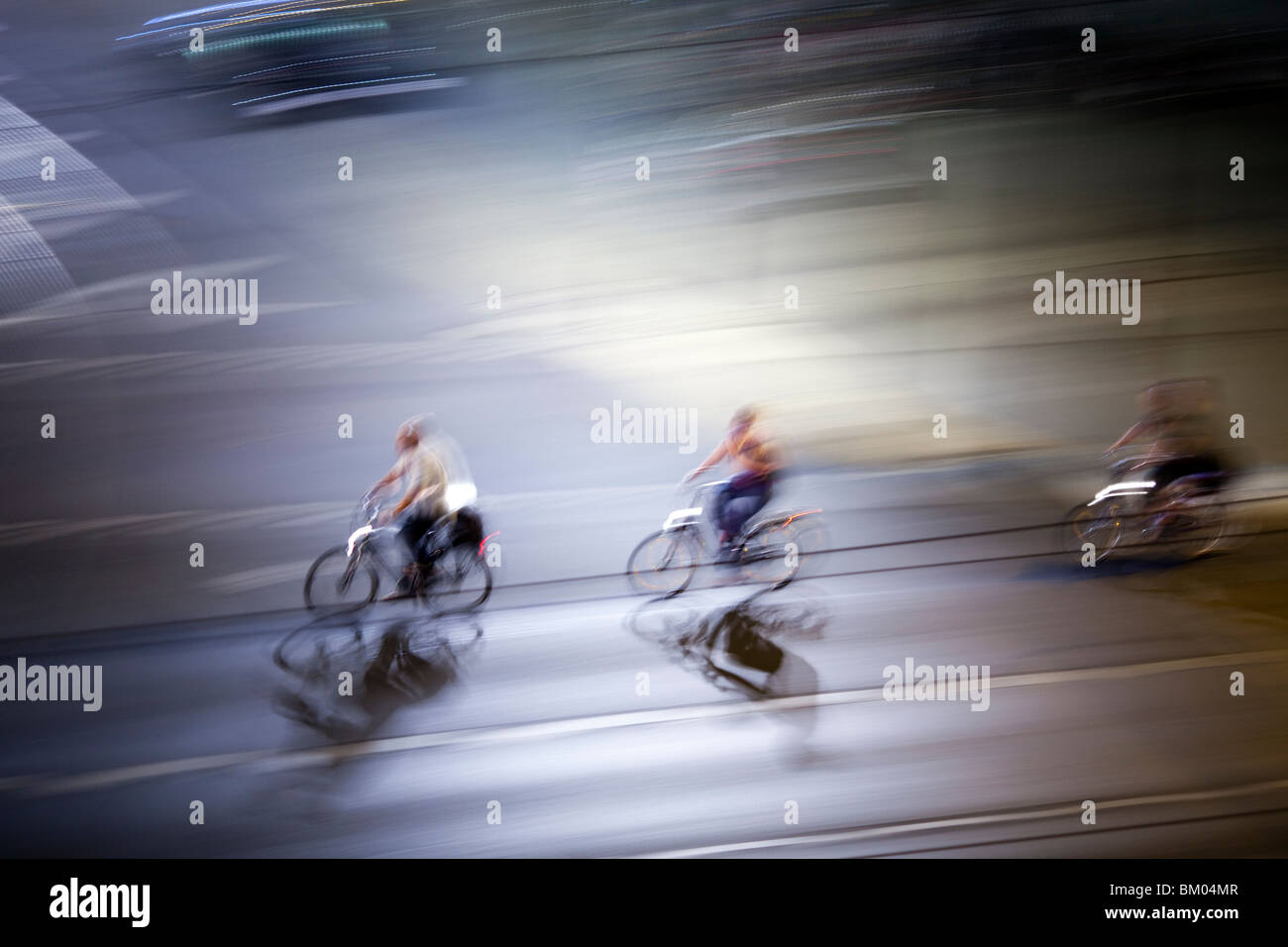 Panning shot of cyclists by night hi-res stock photography and images ...
