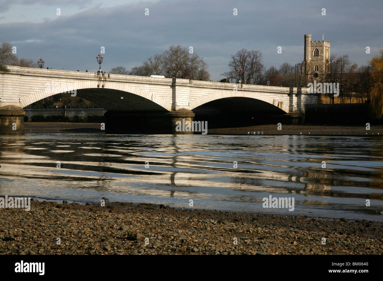 Looking across the River Thames to Putney Bridge and All Saints church ...