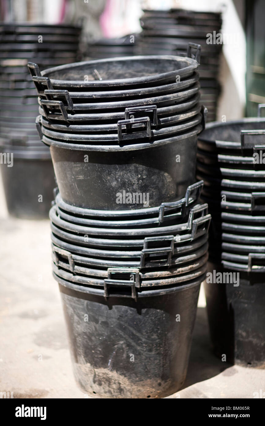 Pile of plastic buckets for park cleaning, Seville, Spain Stock Photo ...