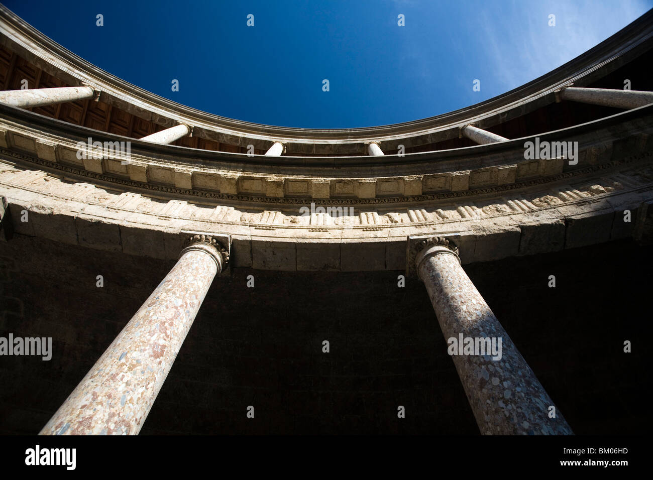 Low angle view of the circular courtyard of the Palace of Charles V ...