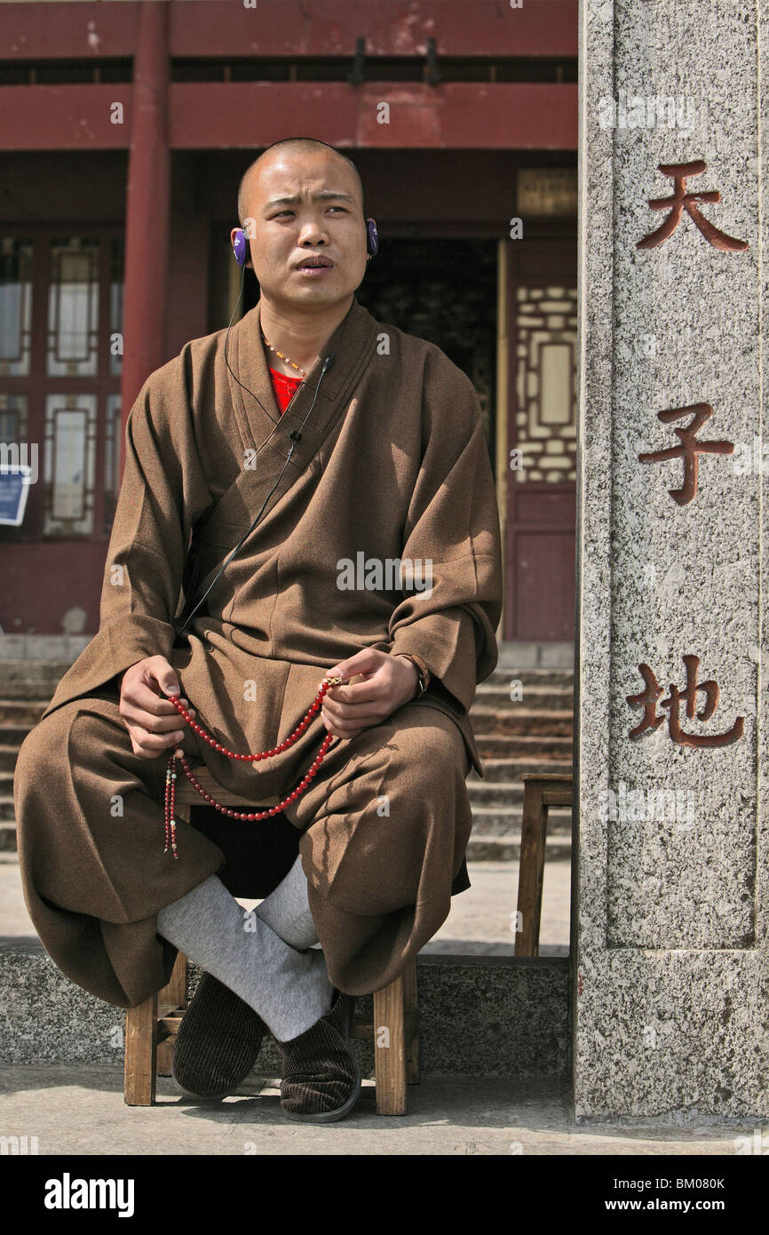 monk with walkman, peak temple Zhu Rong Feng, Heng Shan south, Hunan ...