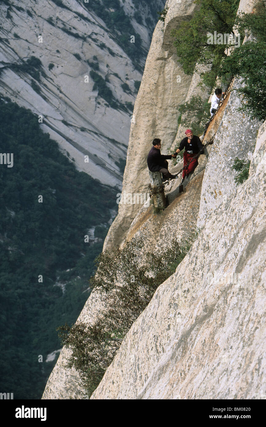 vertical stone cliffs, steps with chain, Taoist mountain, Hua Shan ...