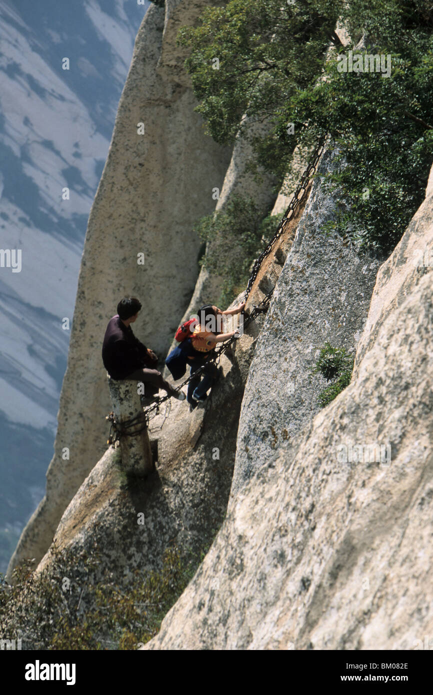vertical stone cliffs, chains and planks, Taoist mountain, Hua Shan ...