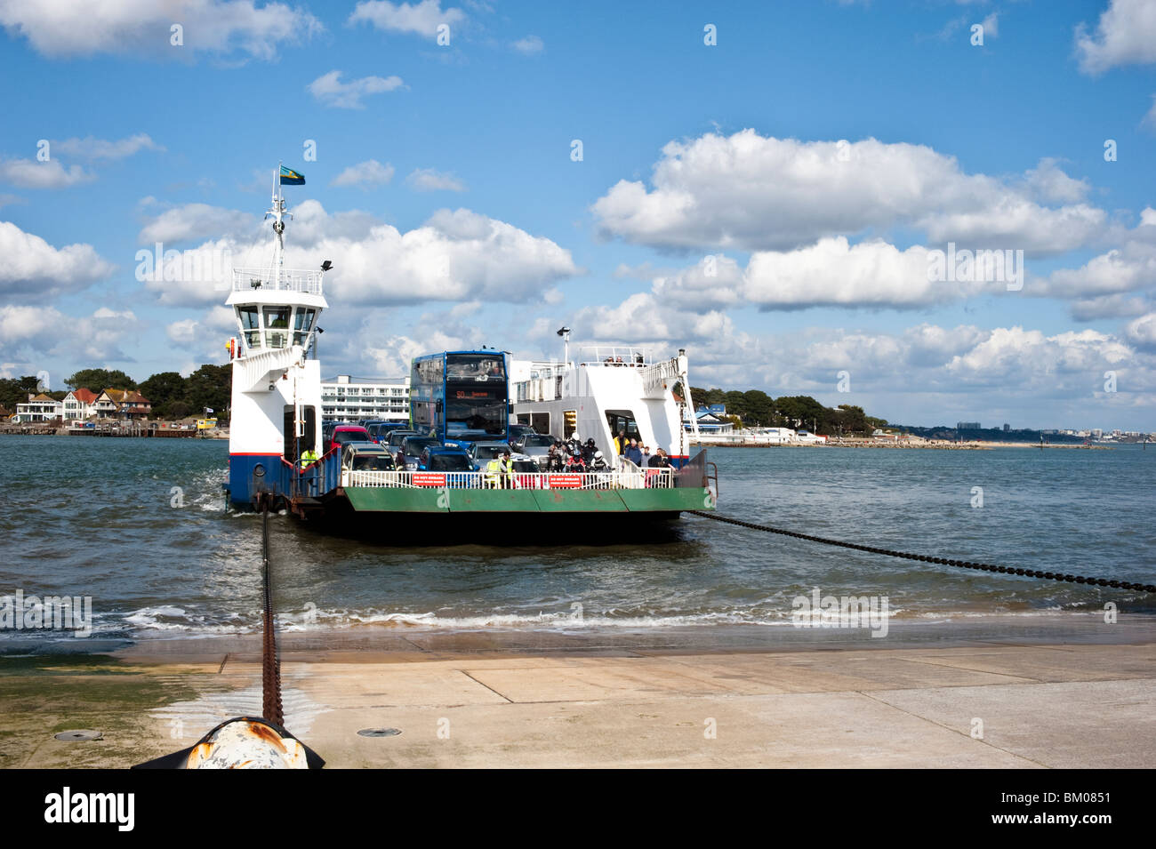 Sandbanks chain ferry arriving at offloading point, Poole Harbour ...