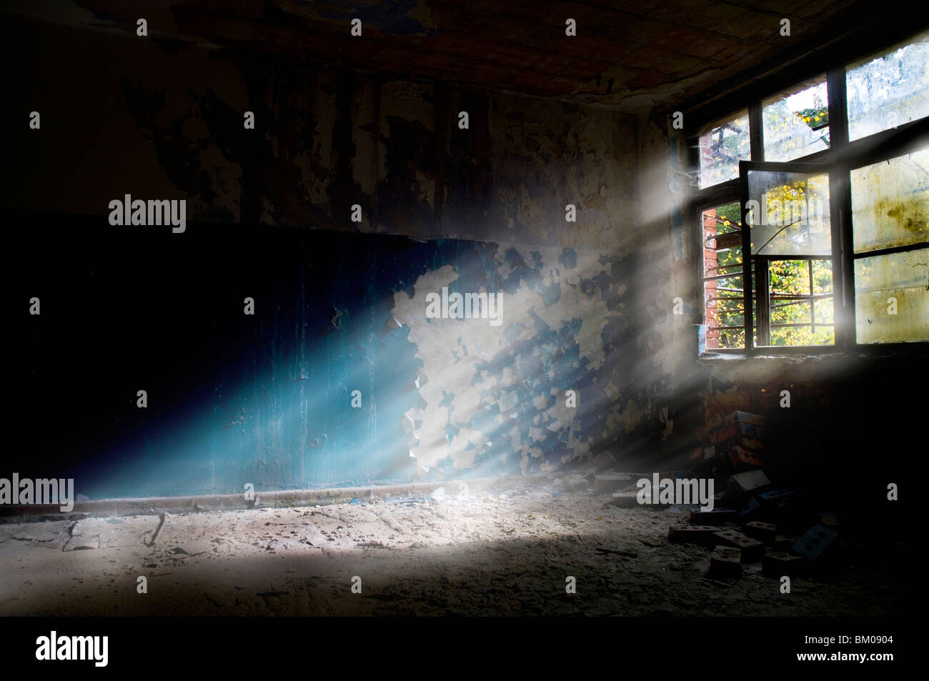 Sunlight shining through an old broken window Stock Photo - Alamy