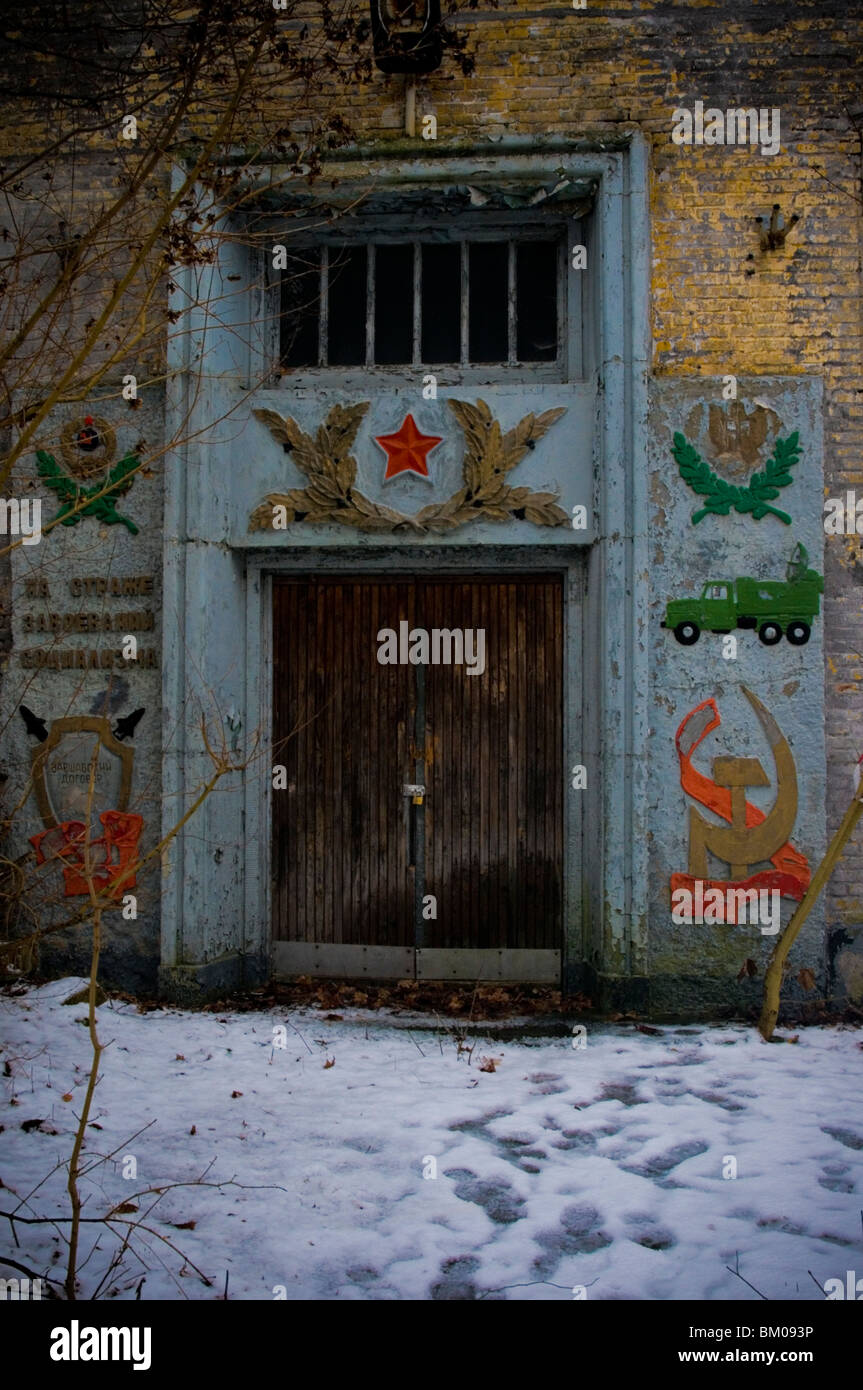 Doorway to old Soviet tanks barracks Stock Photo - Alamy