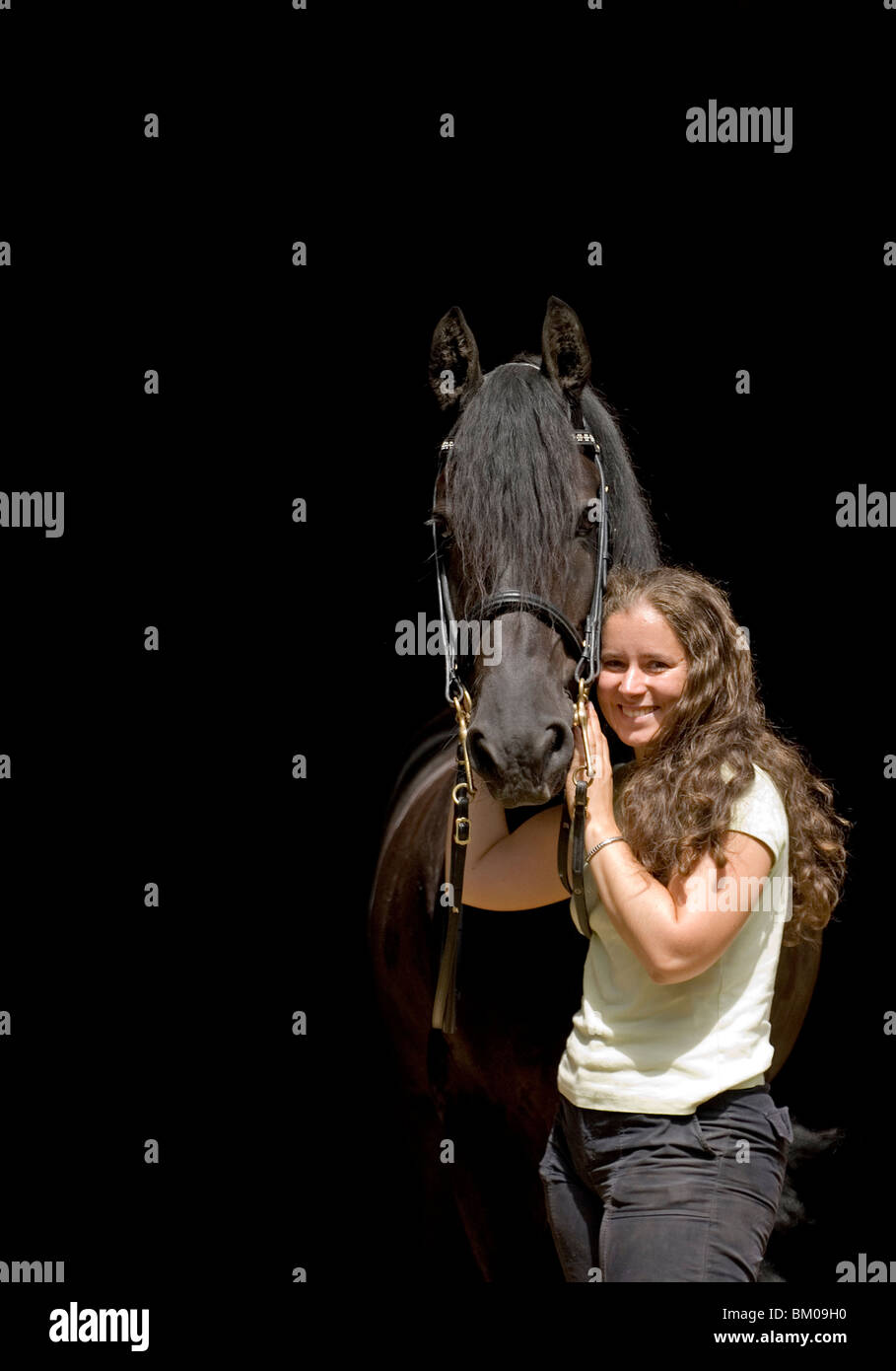 woman and Frisian Stock Photo - Alamy