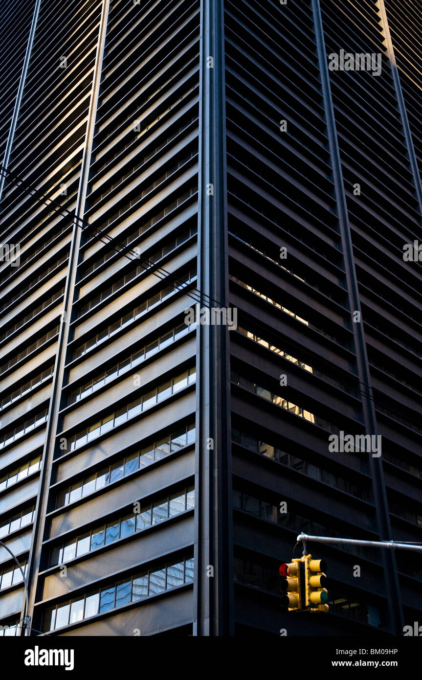 Looking up at a tall skyscraper building in the Financial District of ...
