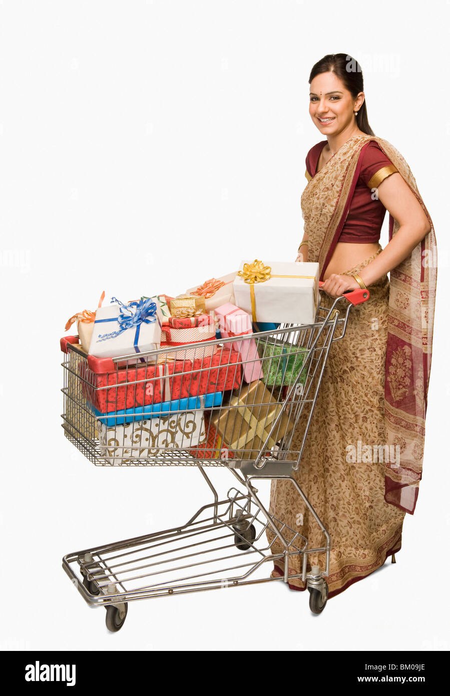 Woman pushing a shopping cart hi-res stock photography and images - Alamy