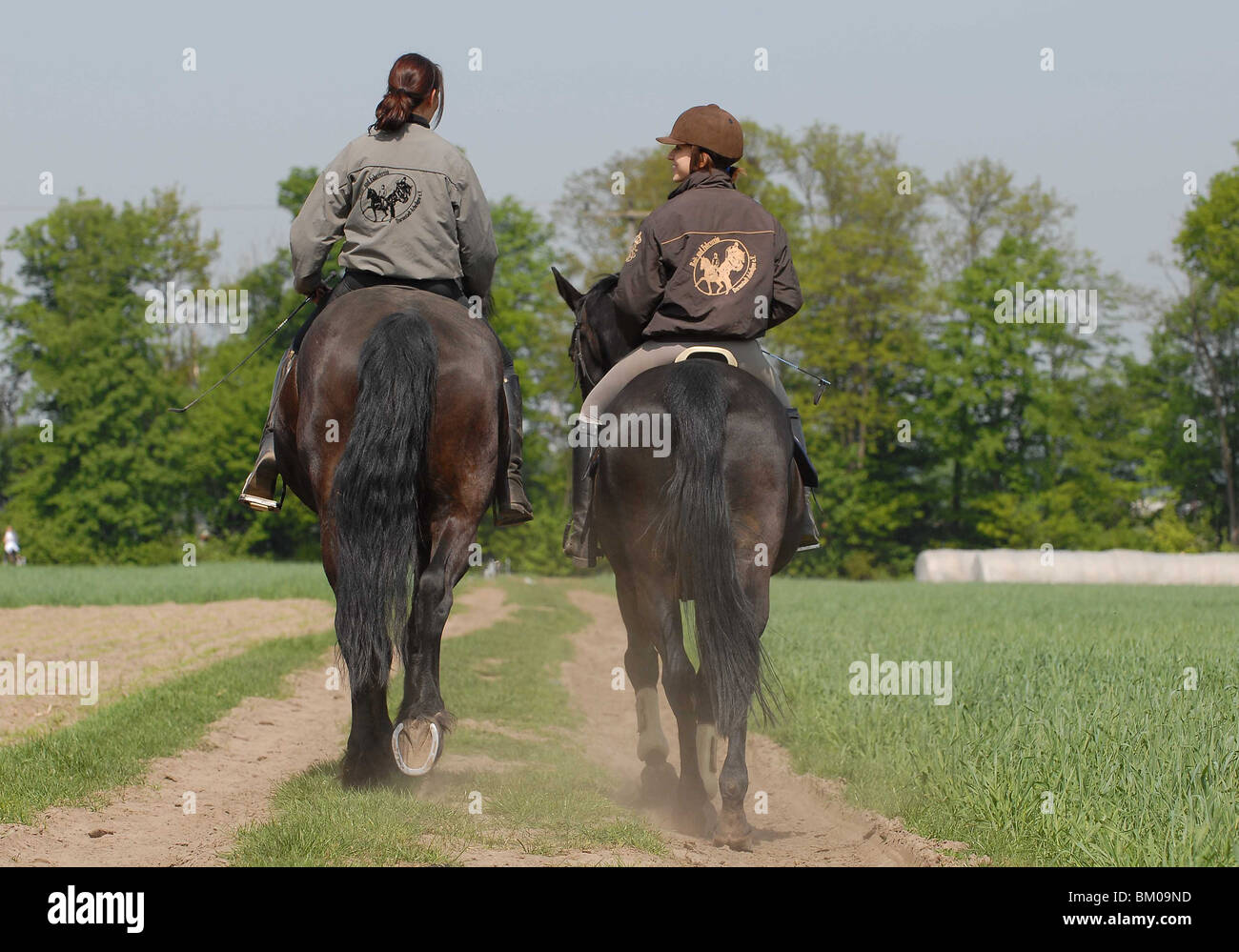 Horse ride 2 people helmets hi-res stock photography and images - Alamy