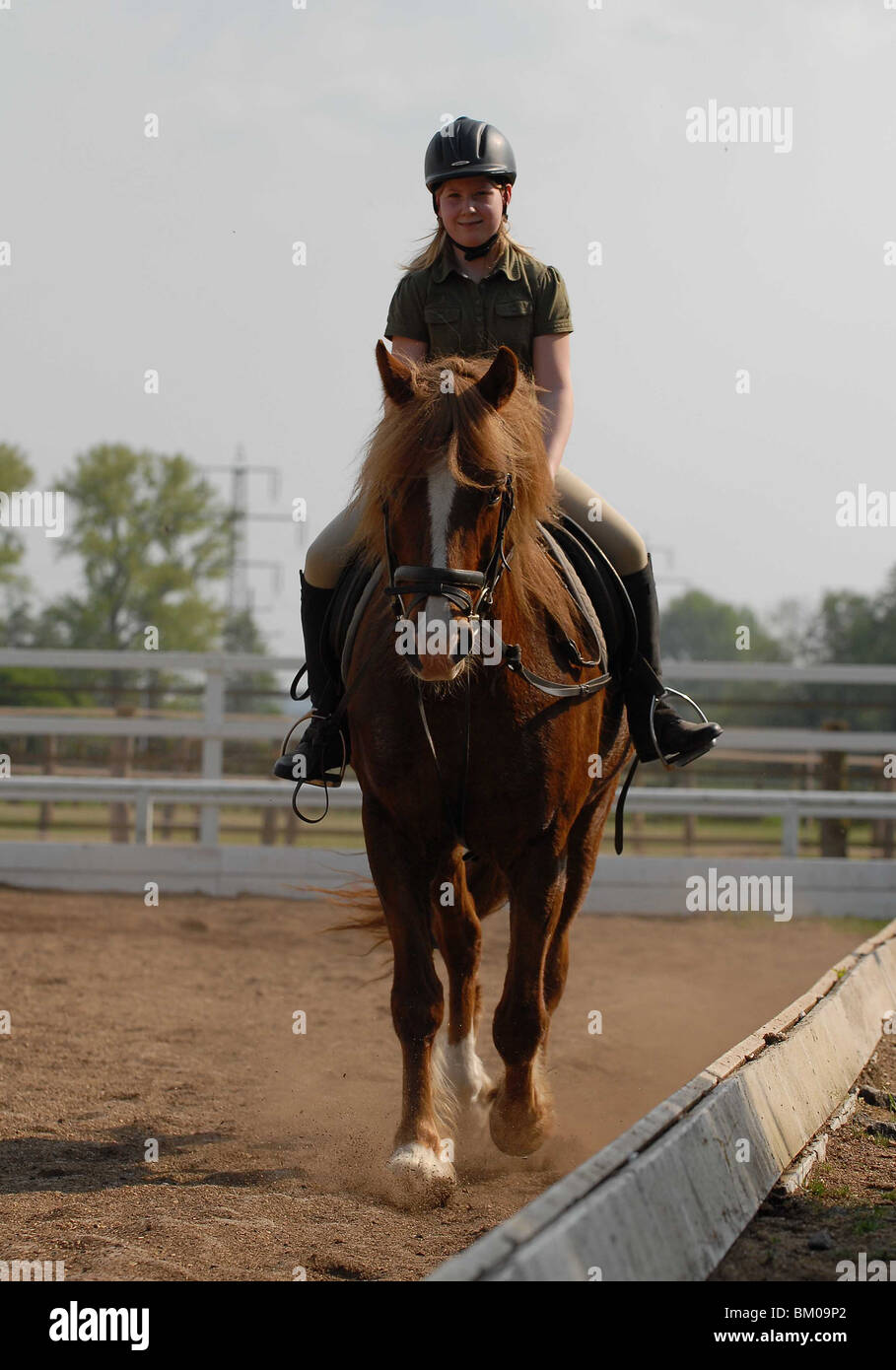 girl rides pony Stock Photo - Alamy