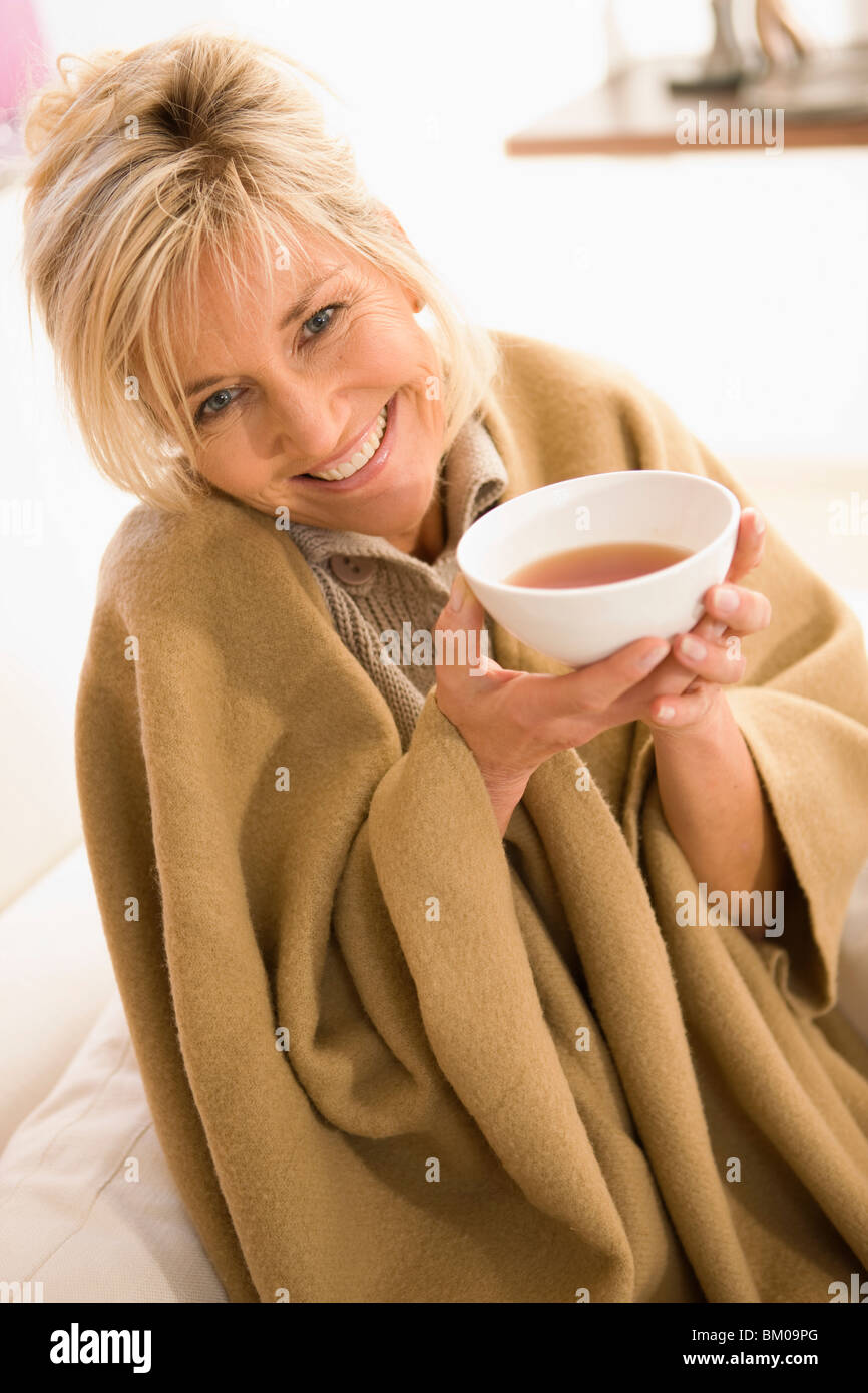 Woman Sipping Tea High Resolution Stock Photography and Images - Alamy