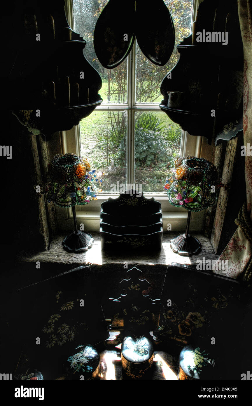 Interior view through a cottage window with ornaments Stock Photo - Alamy