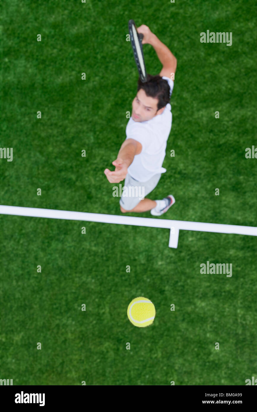 Man playing tennis Stock Photo - Alamy