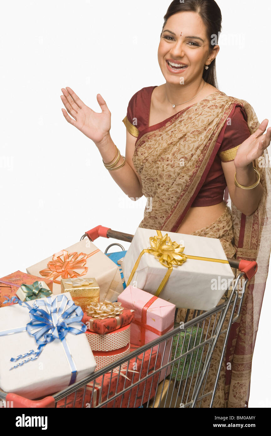Smiling woman near cart hi-res stock photography and images - Alamy