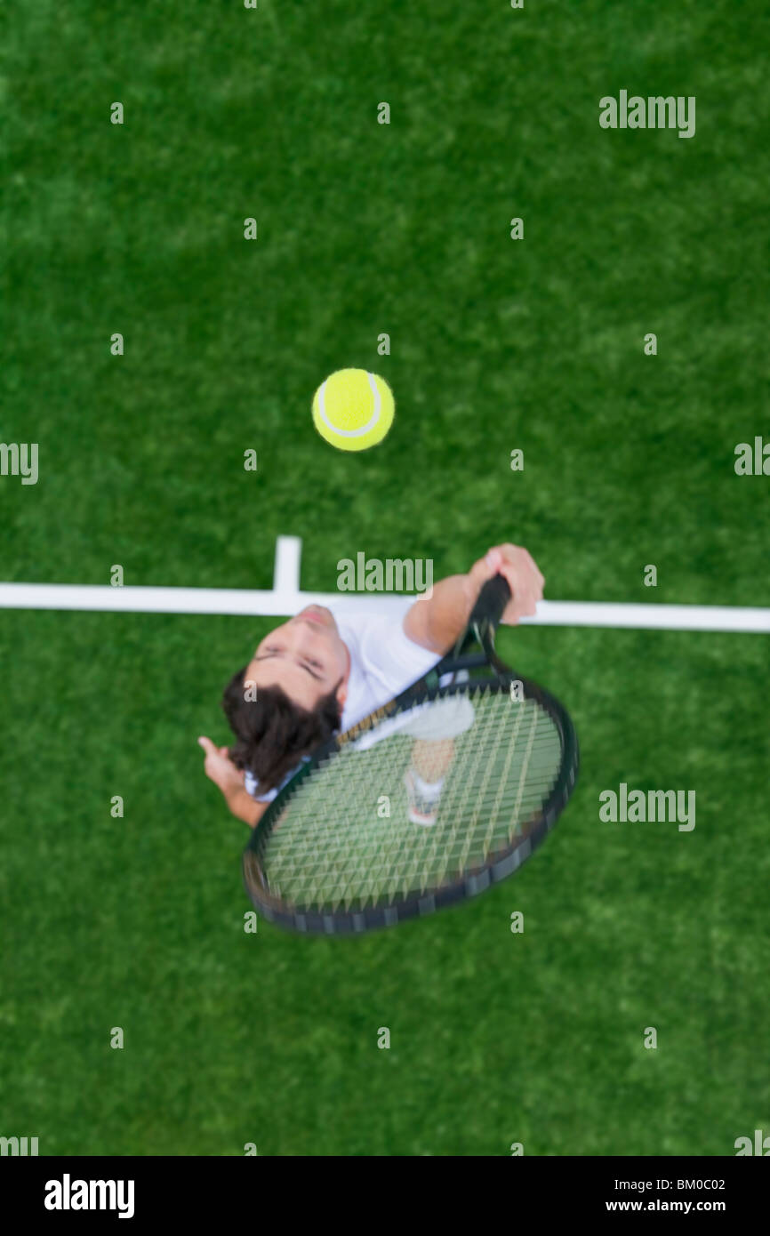 Man playing tennis Stock Photo - Alamy