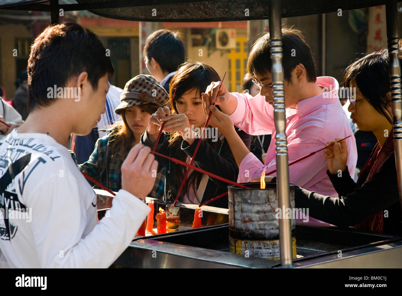 People with incense sticks at Nanputuo temple, Xiamen, Fujian province ...