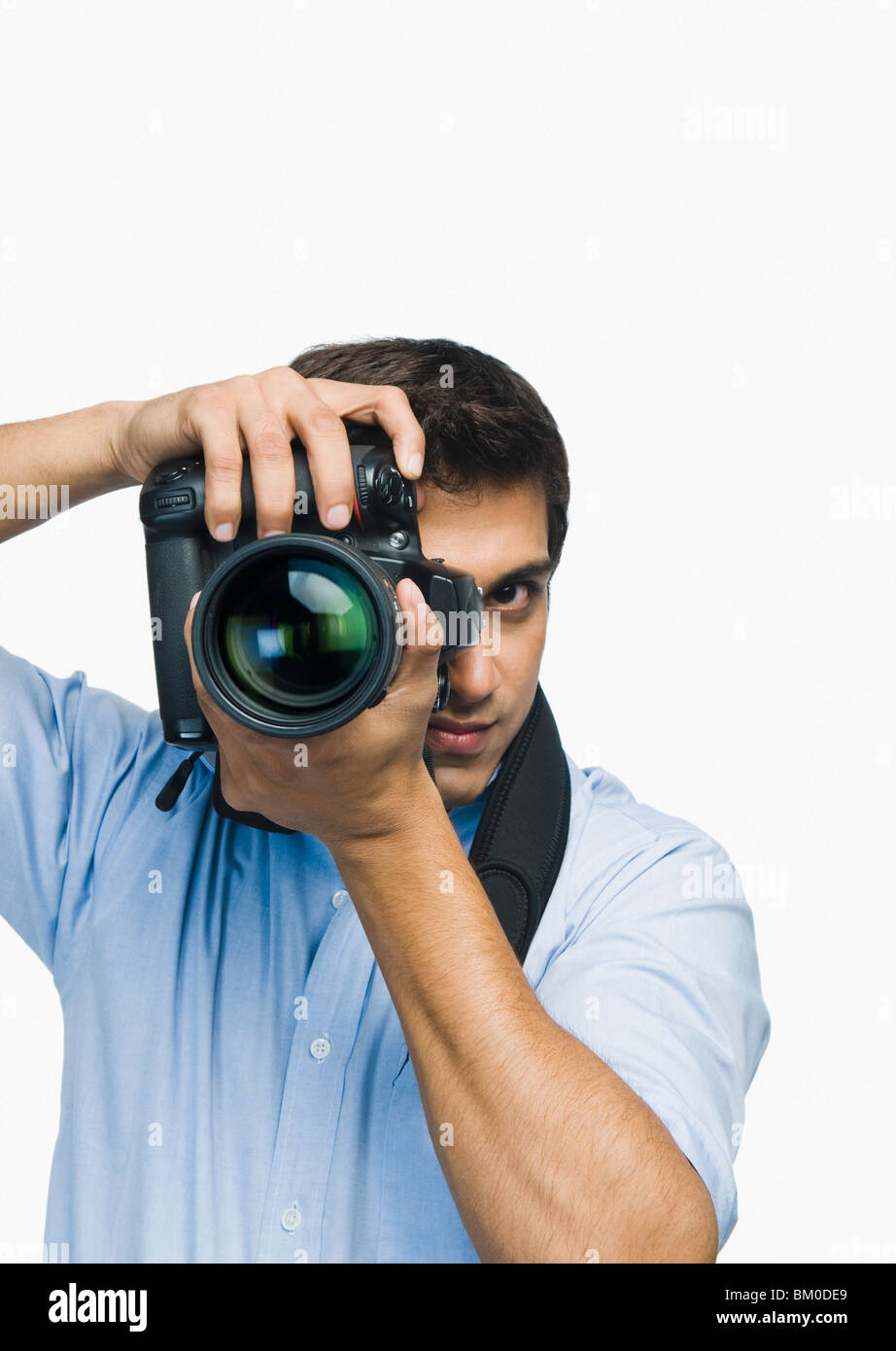 Photographer taking a picture with a digital camera Stock Photo - Alamy