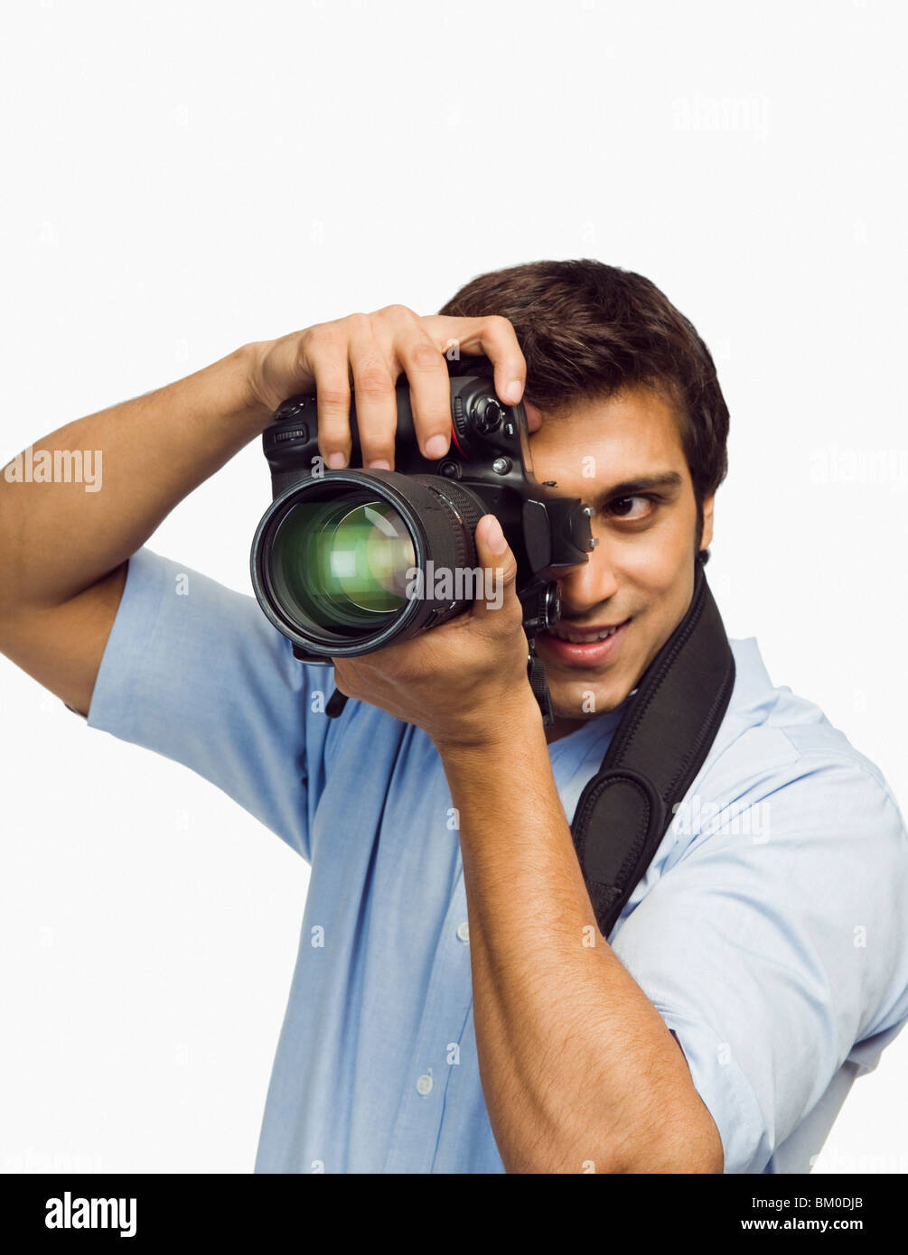 Photographer taking a picture with a digital camera Stock Photo - Alamy