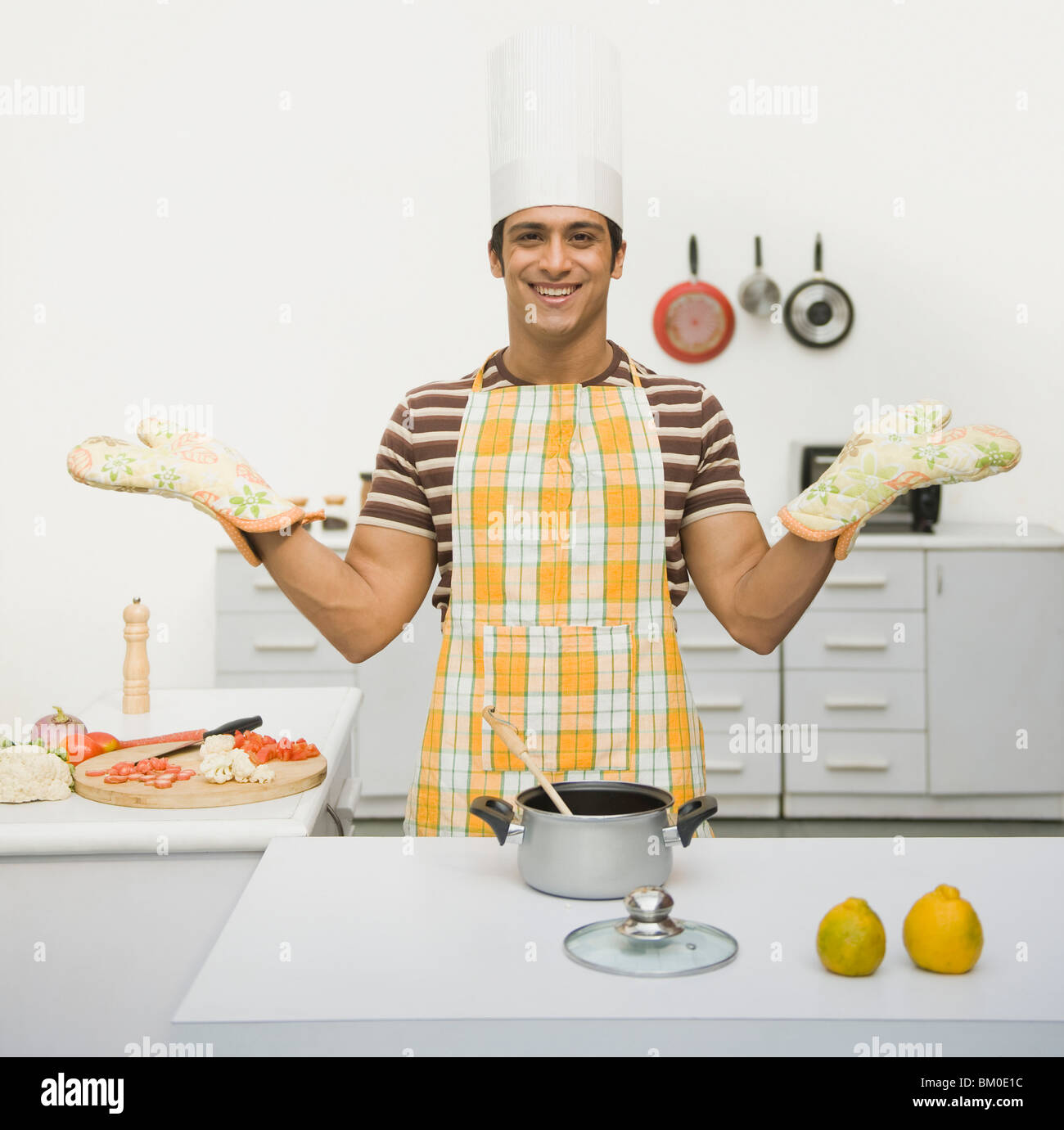 Man cooking in the kitchen Stock Photo - Alamy