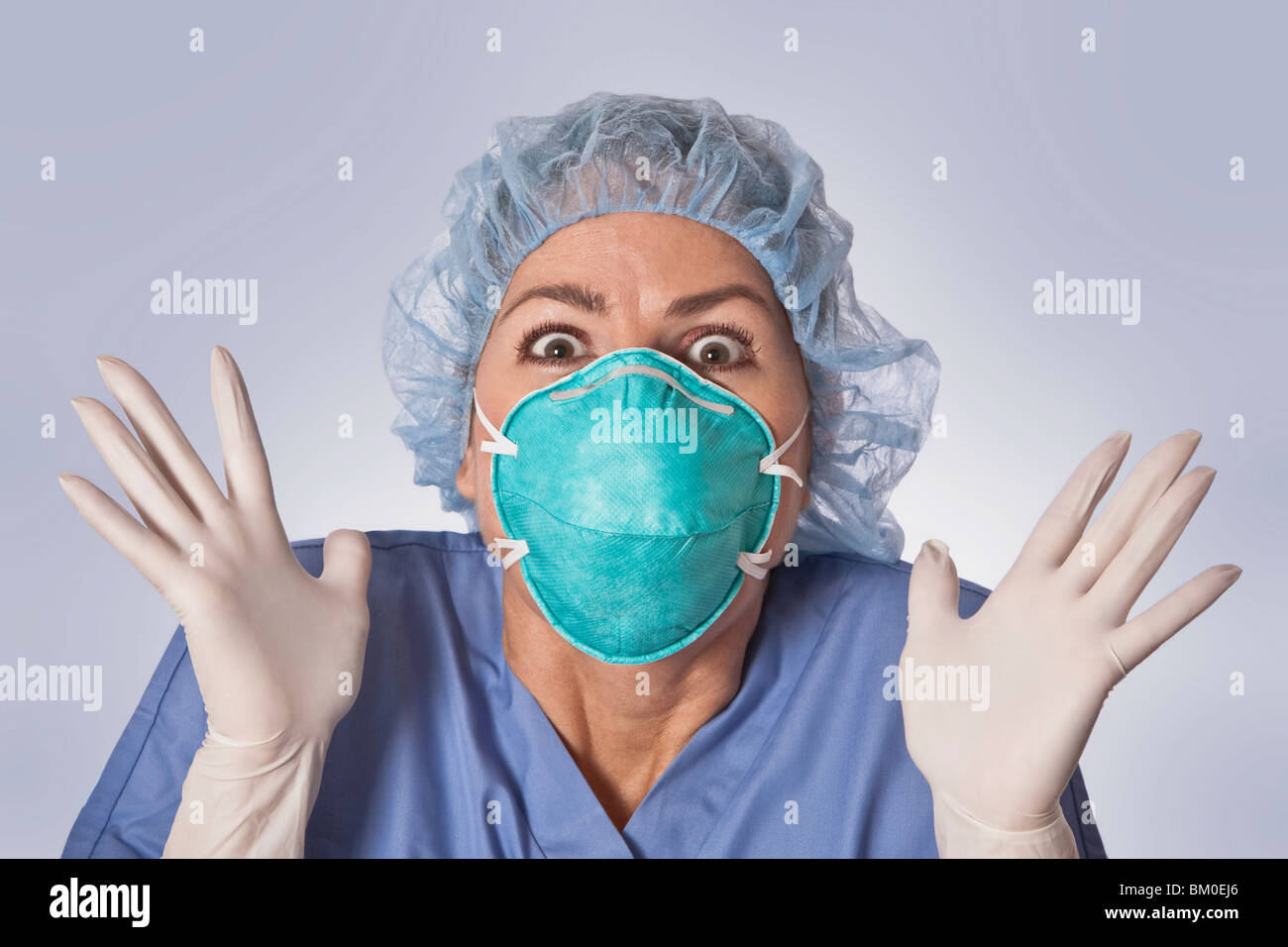 Female surgeon looking shocked Stock Photo - Alamy