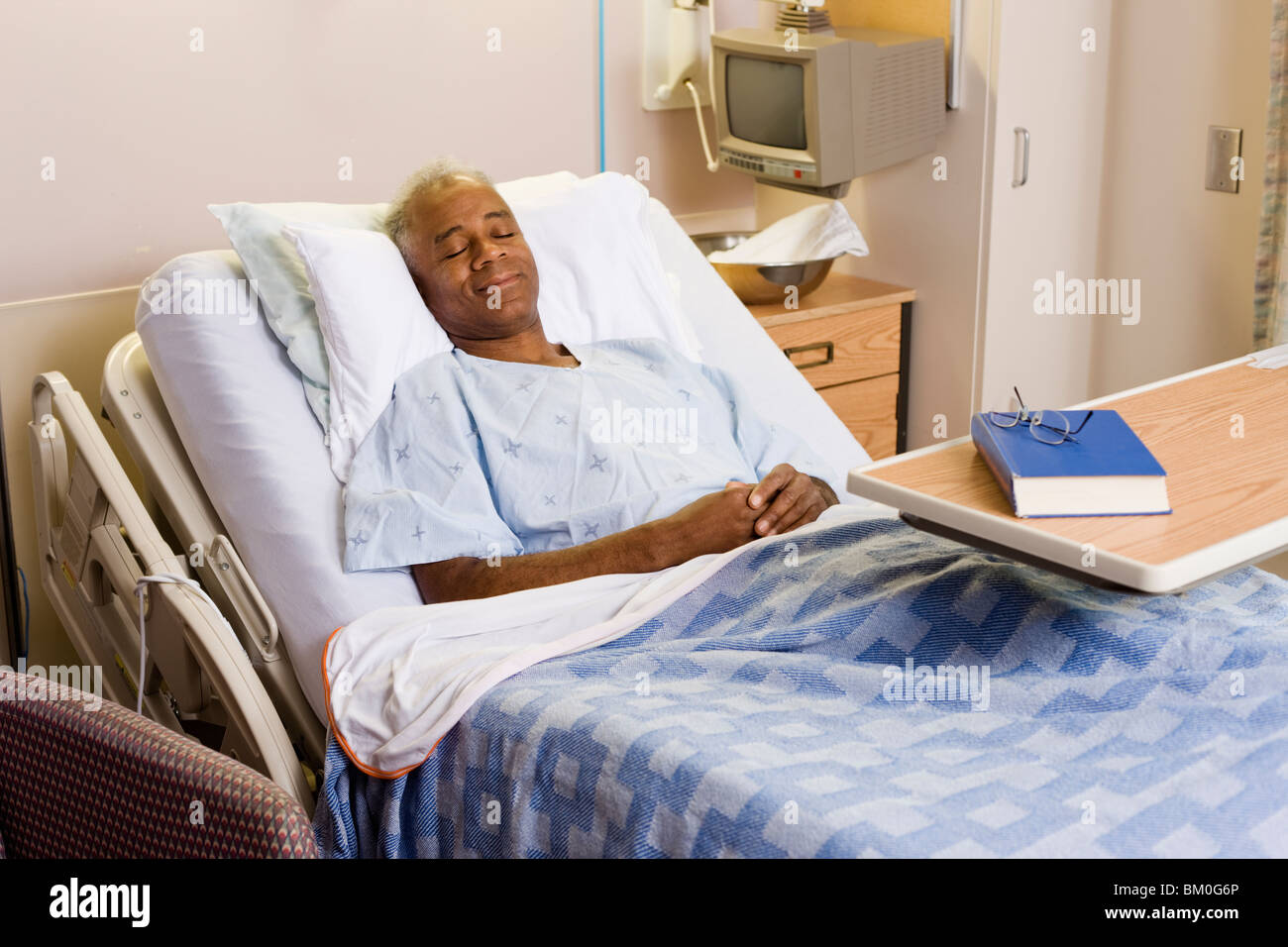 Man sleeping in hospital room, Orangeville, Ontario Stock Photo - Alamy