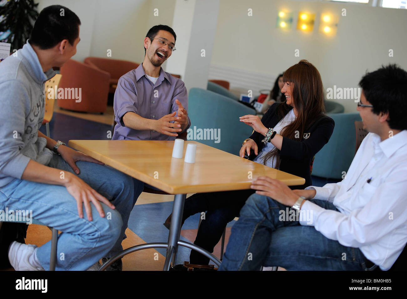 international students talking in a cafe restaurant at Exeter ...
