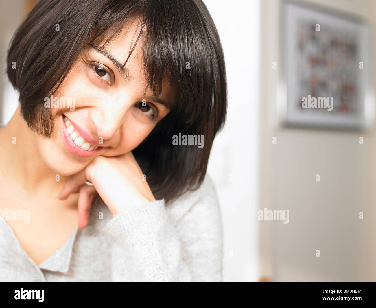 Woman looking at camera, smiling Stock Photo - Alamy