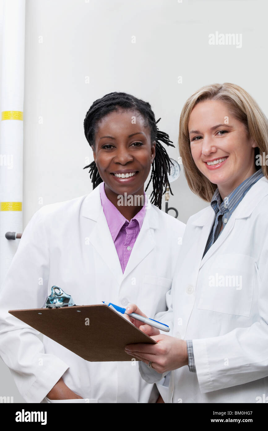 Female doctors working in a laboratory Stock Photo - Alamy