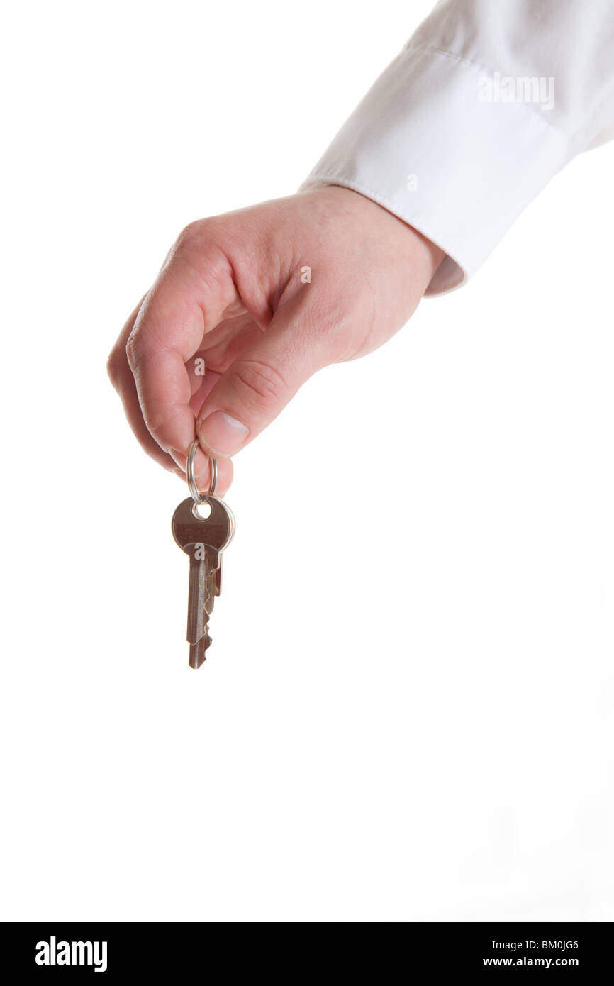keys in hand on white background Stock Photo - Alamy