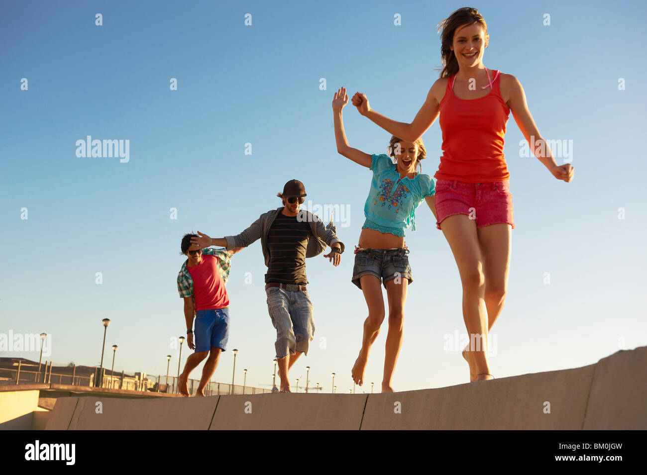 People walking in front wall hi-res stock photography and images - Alamy