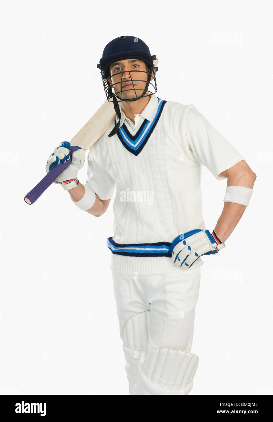 Hand holding cricket bat hi-res stock photography and images - Alamy