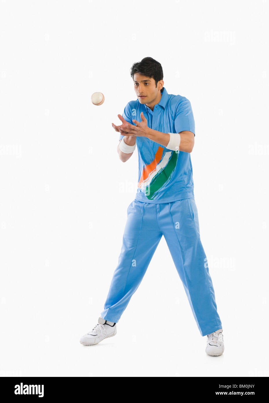 Cricket player catching ball hi-res stock photography and images - Alamy