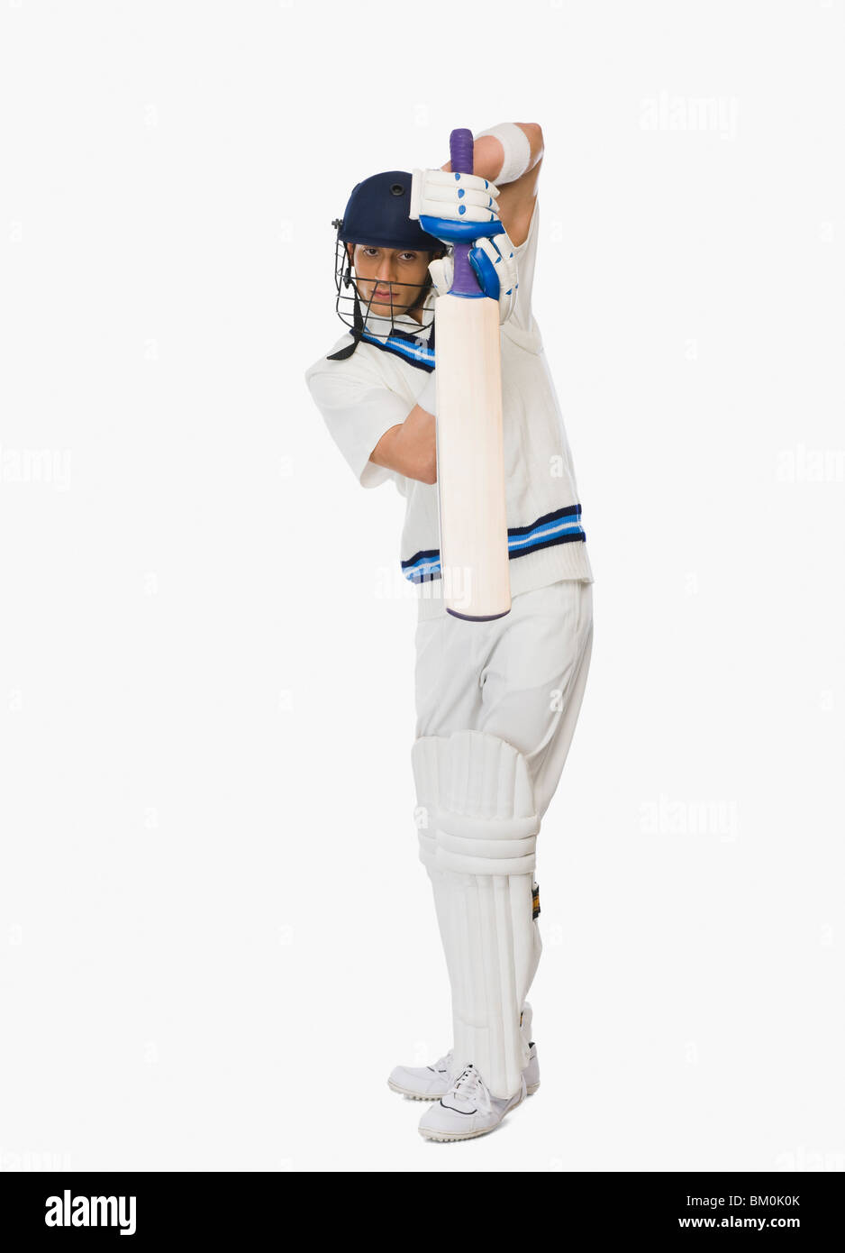 Cricket batsman playing backward defensive stroke Stock Photo - Alamy