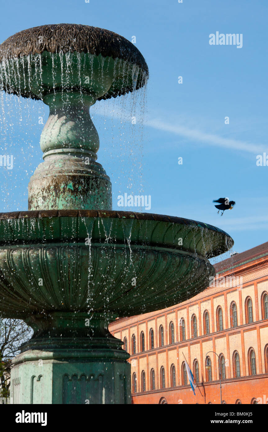 Ludwig Maximilian University buildings with Fountain in Munich, Germany ...