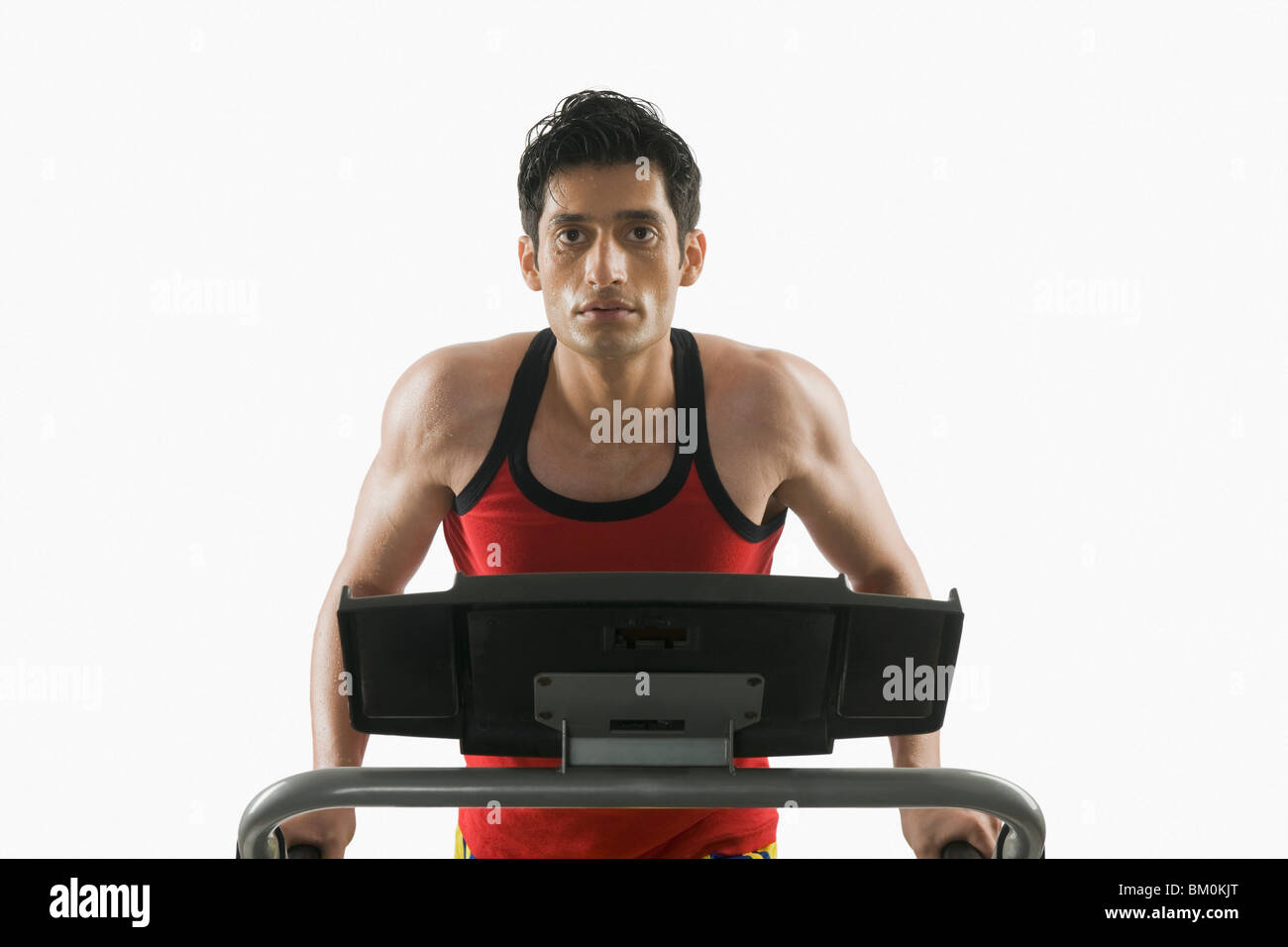 Man running on a treadmill Stock Photo - Alamy