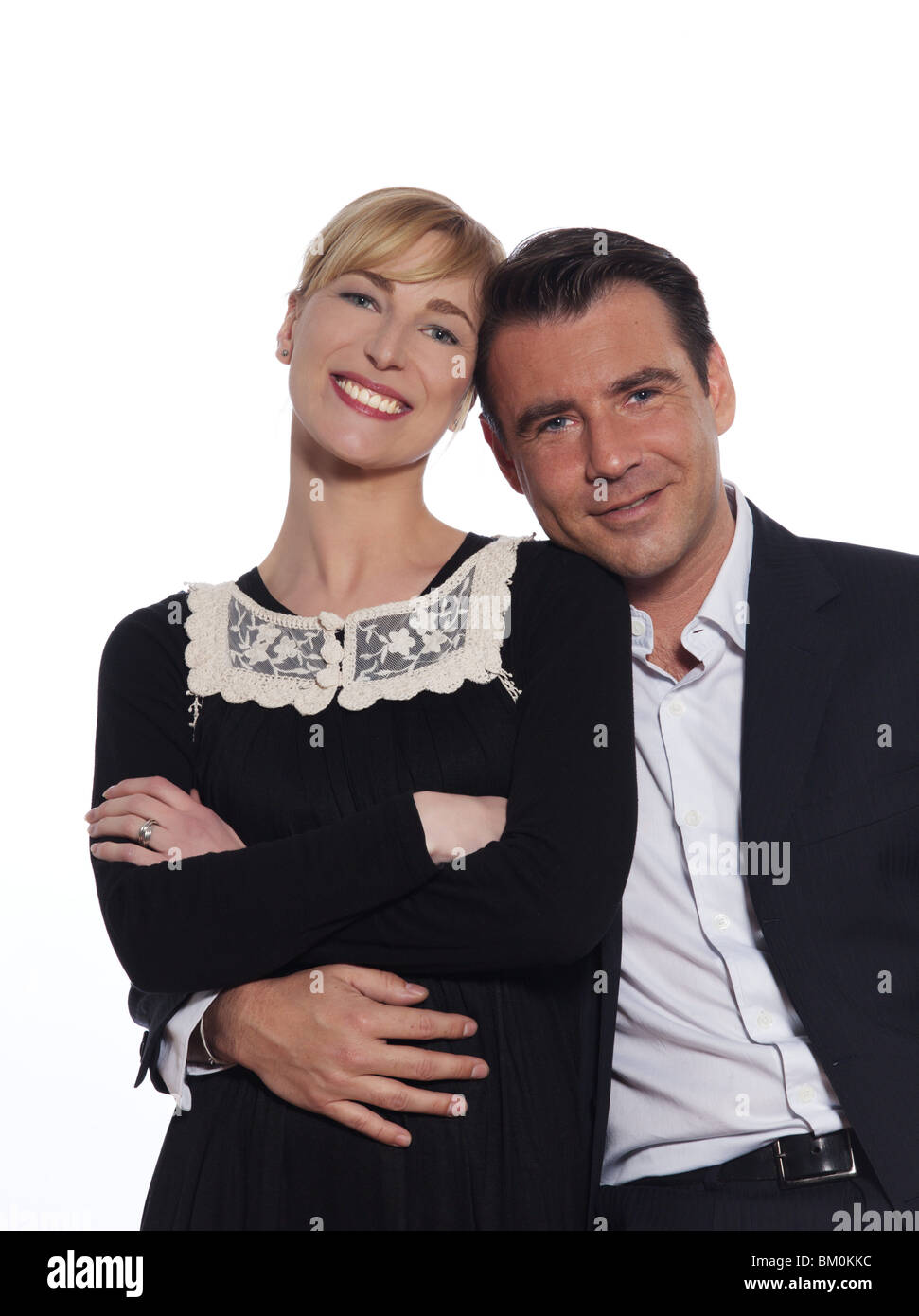 beautiful caucasian couple on studio white background Stock Photo - Alamy