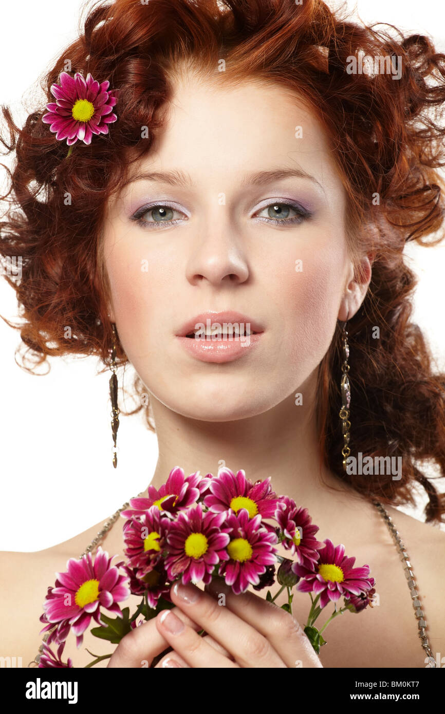 Portrait of a happy women with flowers Stock Photo - Alamy