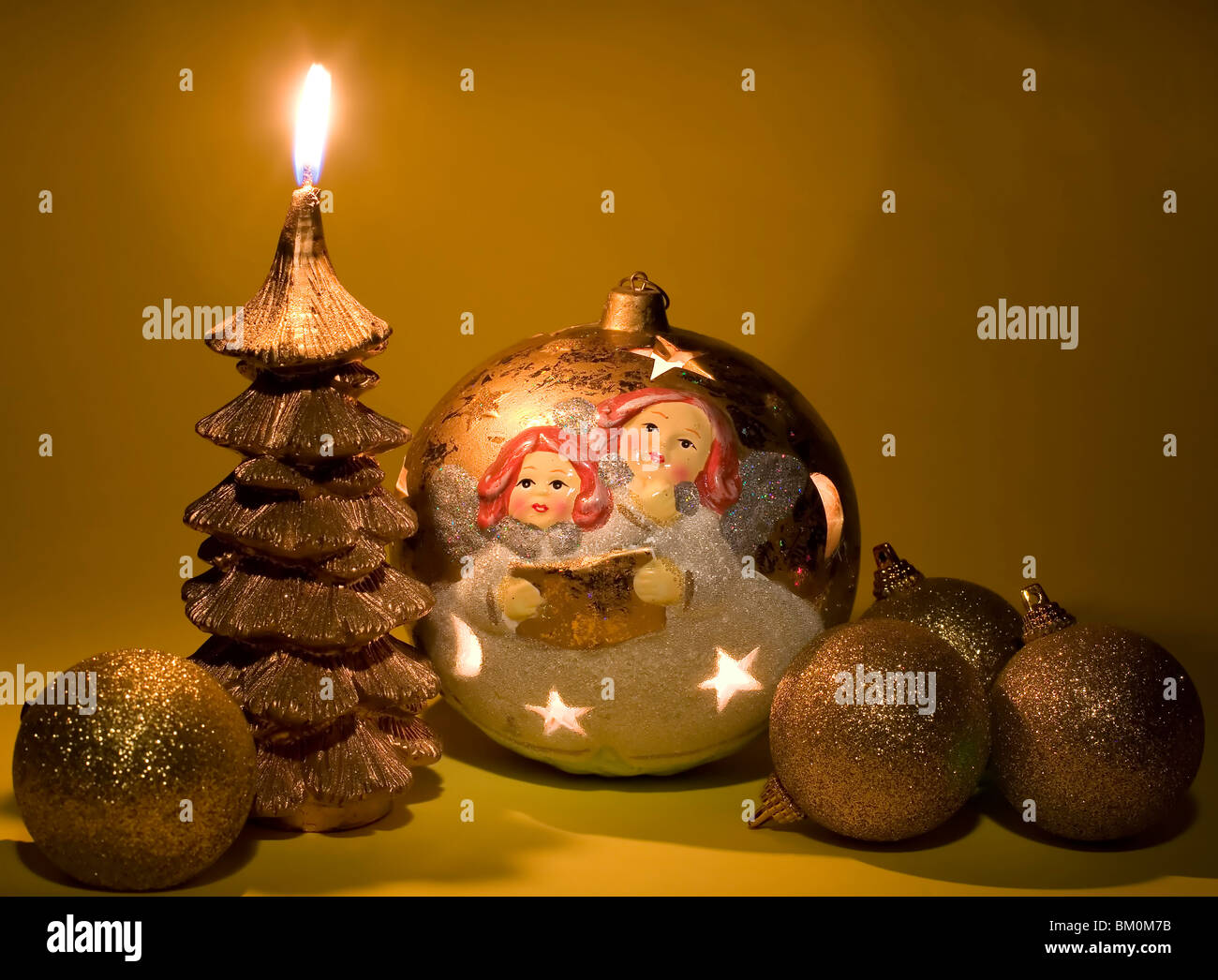 Candle like christmas tree and beautiful toys Stock Photo - Alamy