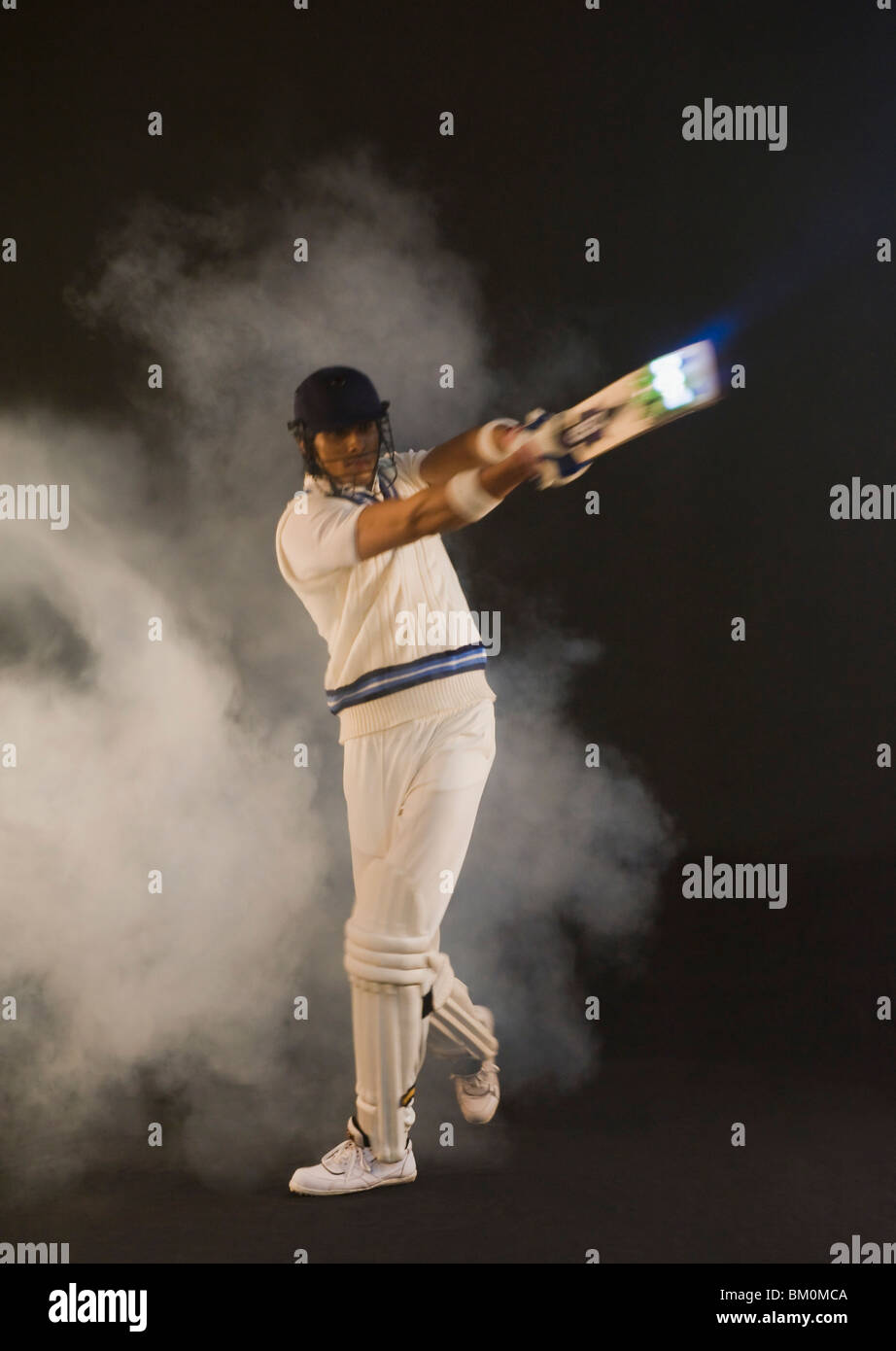 Cricket batsman playing a hook shot Stock Photo - Alamy