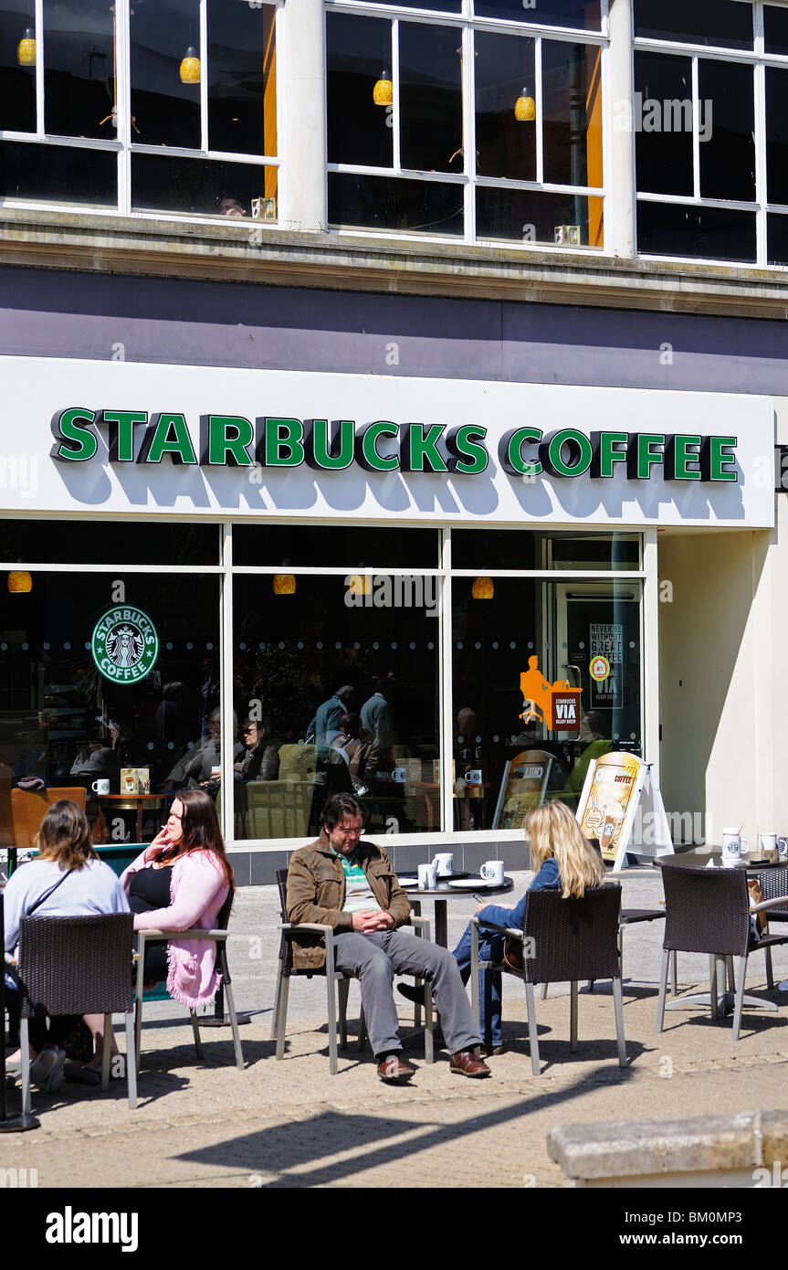 customers relaxing outside starbucks in the city centre plymouth, devon ...