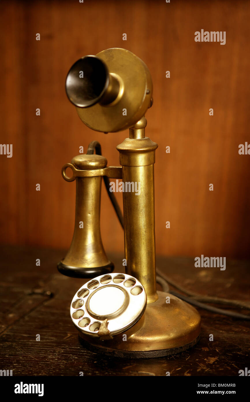 Vintage golden brass spanish old telephone Stock Photo - Alamy