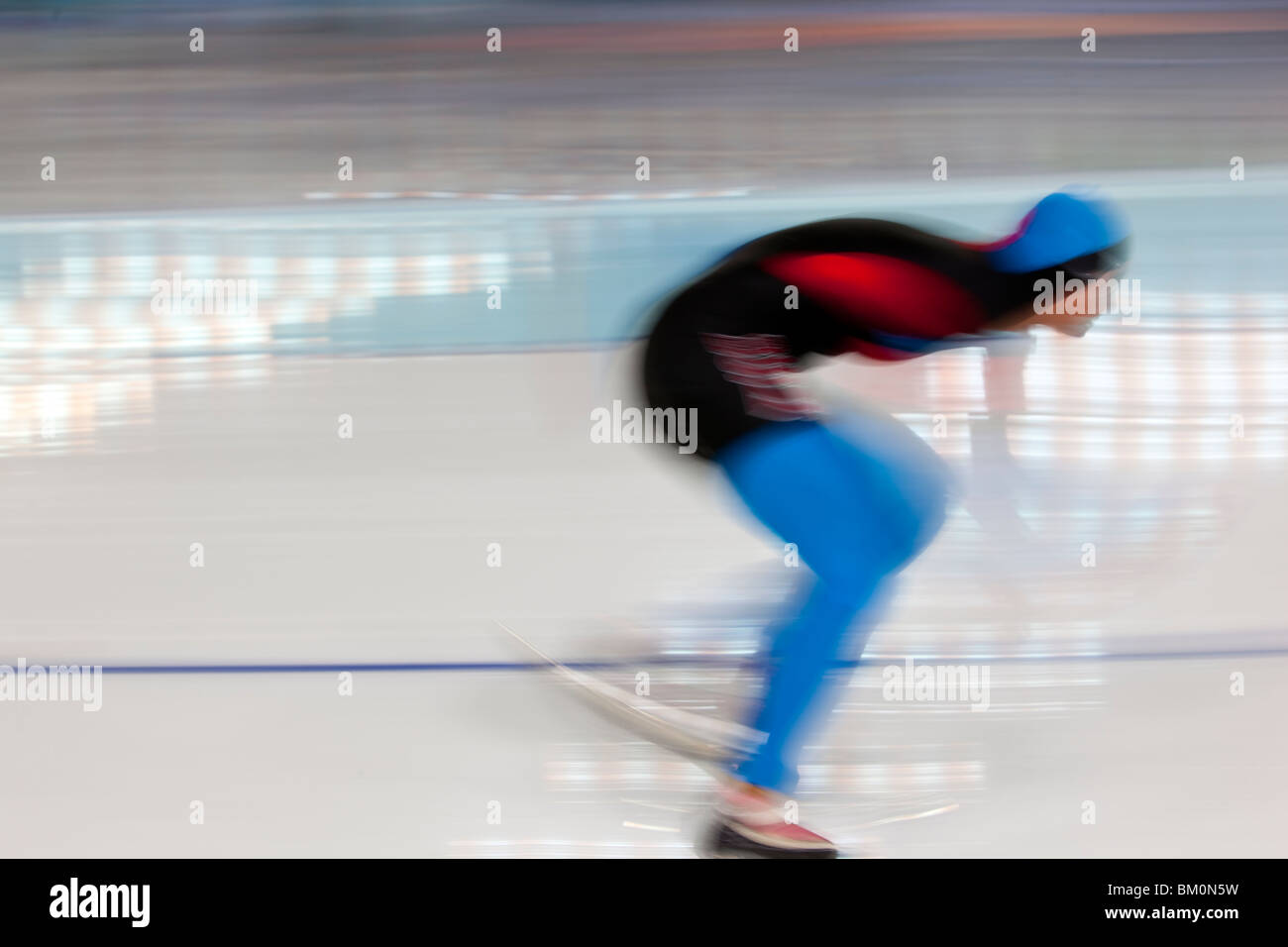 Female speed skating in action Stock Photo - Alamy