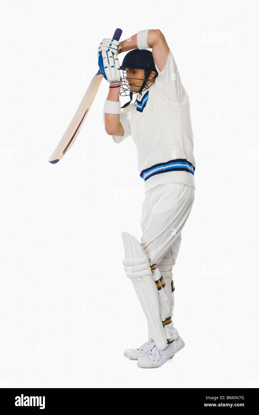 Cricket batsman playing backward defensive stroke Stock Photo - Alamy