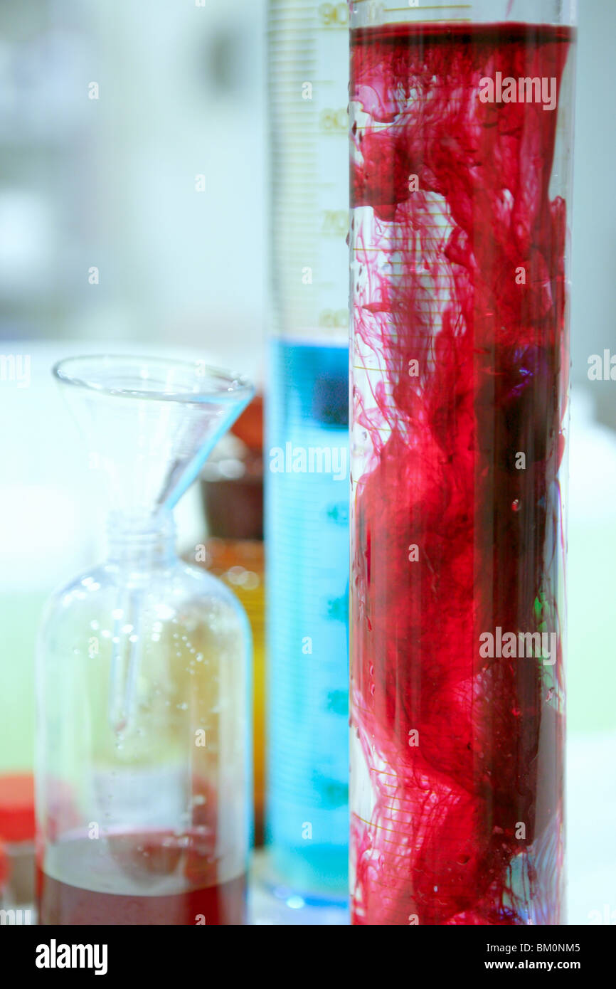 Laboratory stuff, glass cylinder vases, colorful liquids, chemical ...