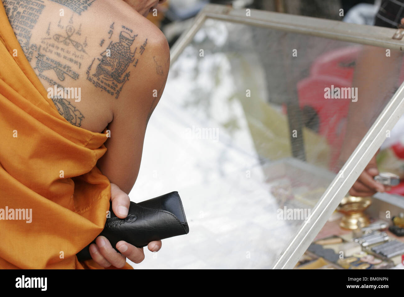 Monk with a tattoo hi-res stock photography and images - Alamy