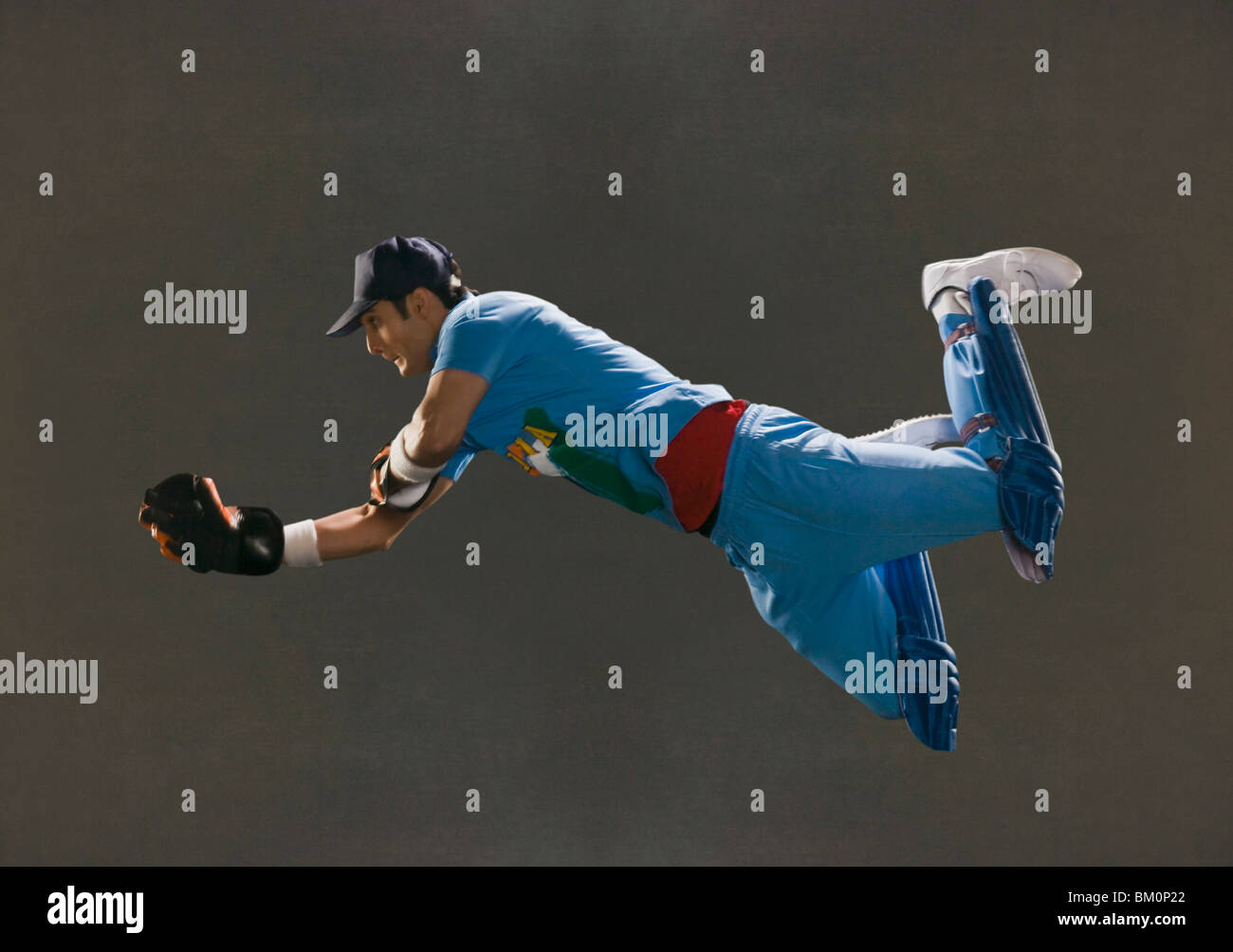 Wicket keeper diving to catch ball hi-res stock photography and images ...